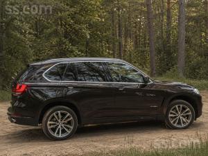 Brown BMW X5 2014 in Riga, with an engine capacity of 2.00 L and mileage of 196 thousand km for 19190 €, photo 5 on AUTOMOTO.COM.LV