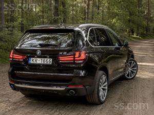 Brown BMW X5 2014 in Riga, with an engine capacity of 2.00 L and mileage of 196 thousand km for 19190 €, photo 6 on AUTOMOTO.COM.LV