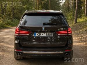 Brown BMW X5 2014 in Riga, with an engine capacity of 2.00 L and mileage of 196 thousand km for 19190 €, photo 7 on AUTOMOTO.COM.LV