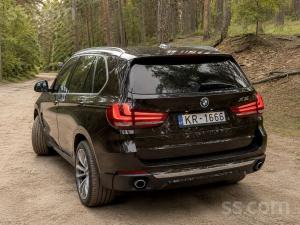 Brown BMW X5 2014 in Riga, with an engine capacity of 2.00 L and mileage of 196 thousand km for 19190 €, photo 8 on AUTOMOTO.COM.LV