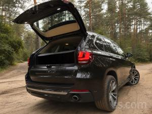 Brown BMW X5 2014 in Riga, with an engine capacity of 2.00 L and mileage of 196 thousand km for 19190 €, photo 12 on AUTOMOTO.COM.LV
