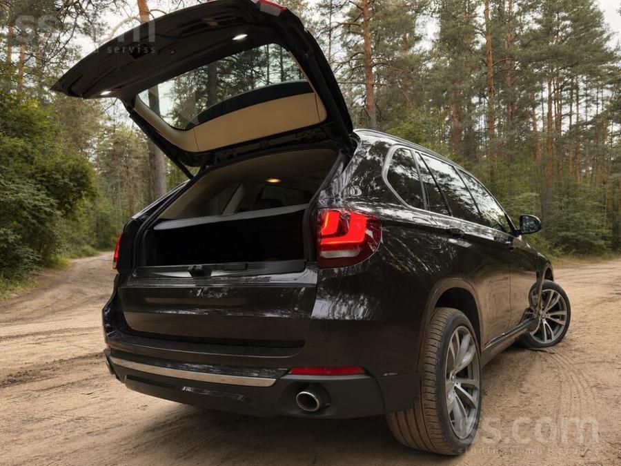 Brown BMW X5 2014 in Riga, with an engine capacity of 2.00 L and mileage of 196 thousand km for 19190 €, photo 12 on AUTOMOTO.COM.LV