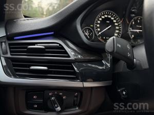 Brown BMW X5 2014 in Riga, with an engine capacity of 2.00 L and mileage of 196 thousand km for 19190 €, photo 16 on AUTOMOTO.COM.LV