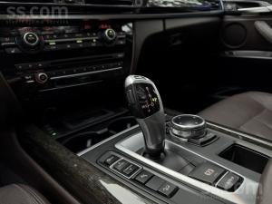 Brown BMW X5 2014 in Riga, with an engine capacity of 2.00 L and mileage of 196 thousand km for 19190 €, photo 19 on AUTOMOTO.COM.LV