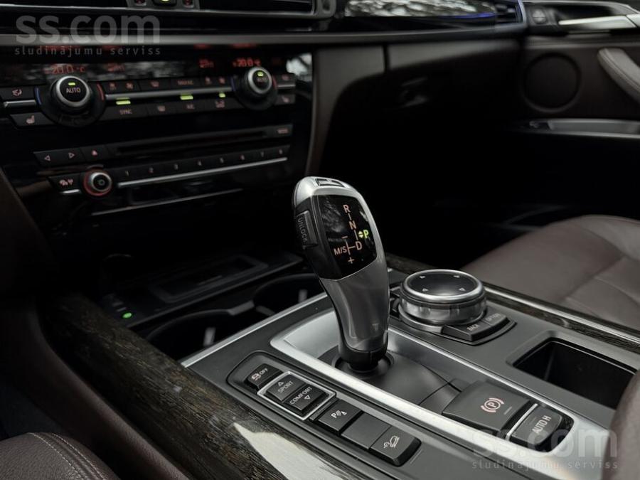 Brown BMW X5 2014 in Riga, with an engine capacity of 2.00 L and mileage of 196 thousand km for 19190 €, photo 19 on AUTOMOTO.COM.LV