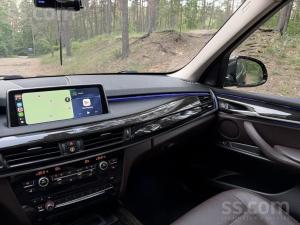 Brown BMW X5 2014 in Riga, with an engine capacity of 2.00 L and mileage of 196 thousand km for 19190 €, photo 21 on AUTOMOTO.COM.LV