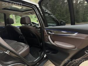 Brown BMW X5 2014 in Riga, with an engine capacity of 2.00 L and mileage of 196 thousand km for 19190 €, photo 24 on AUTOMOTO.COM.LV