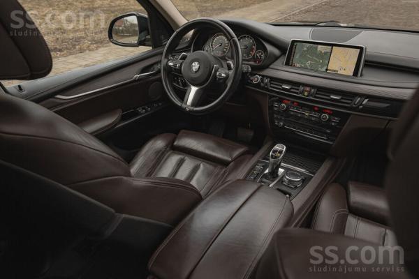 Brown BMW X5 2014 in Jelgava, with an engine capacity of 3.00 L and mileage of 234 thousand km for 22900 €, photo 9 on AUTOMOTO.COM.LV