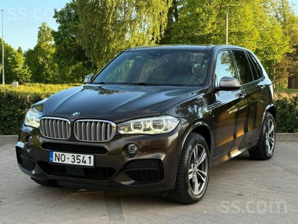 Brown BMW X5 2014 in Riga, with an engine capacity of 3.00 L and mileage of 0 thousand km for 16990 €, photo 3 on AUTOMOTO.COM.LV