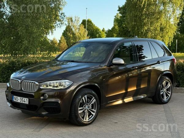 Brown BMW X5 2014 in Riga, with an engine capacity of 3.00 L and mileage of 0 thousand km for 16990 €, photo 5 on AUTOMOTO.COM.LV