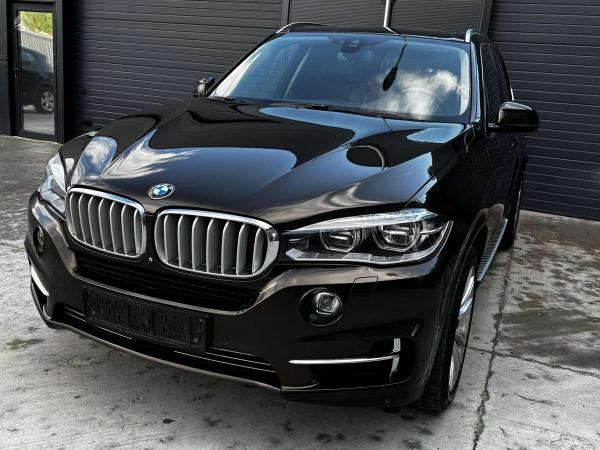 Brown BMW X5 2014 in Utena, with an engine capacity of 3.00 L and mileage of 330 thousand km for 13900 €, photo 4 on AUTOMOTO.COM.LV