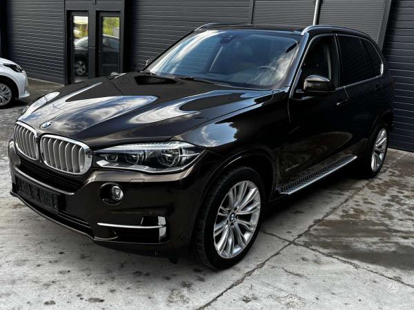 Brown BMW X5 2014 in Utena, with an engine capacity of 3.00 L and mileage of 330 thousand km for 13900 €, photo 5 on AUTOMOTO.COM.LV