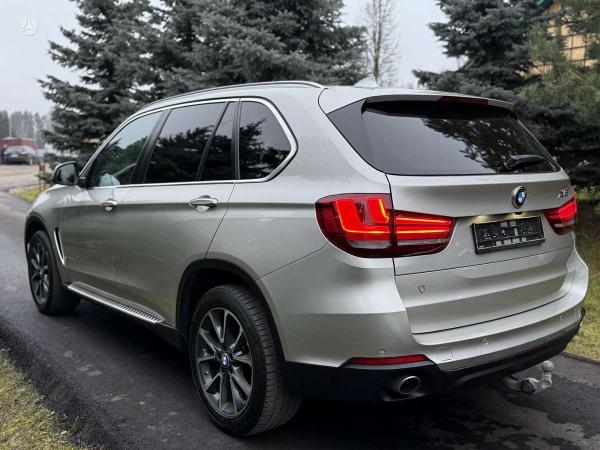 Brown BMW X5 2015 in Utena, with an engine capacity of 2.00 L and mileage of 297 thousand km for 16990 €, photo 6 on AUTOMOTO.COM.LV
