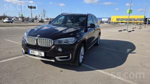 Brown BMW X5 2015 in Riga, with an engine capacity of 3.00 L and mileage of 250 thousand km for 21500 €, photo  on AUTOMOTO.COM.LV