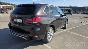 Brown BMW X5 2015 in Riga, with an engine capacity of 3.00 L and mileage of 250 thousand km for 21500 €, photo 4 on AUTOMOTO.COM.LV
