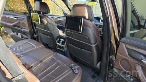 Brown BMW X5 2015 in Riga, with an engine capacity of 3.00 L and mileage of 250 thousand km for 21500 €, photo 16 on AUTOMOTO.COM.LV