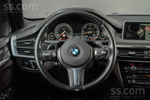 Brown BMW X5 2015 in Riga, with an engine capacity of 3.00 L and mileage of 237 thousand km for 21990 €, photo 17 on AUTOMOTO.COM.LV