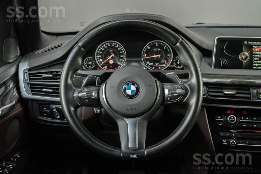 Brown BMW X5 2015 in Riga, with an engine capacity of 3.00 L and mileage of 237 thousand km for 21990 €, photo 17 on AUTOMOTO.COM.LV