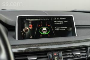 Brown BMW X5 2015 in Riga, with an engine capacity of 3.00 L and mileage of 237 thousand km for 21990 €, photo 23 on AUTOMOTO.COM.LV