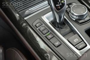 Brown BMW X5 2015 in Riga, with an engine capacity of 3.00 L and mileage of 237 thousand km for 21990 €, photo 26 on AUTOMOTO.COM.LV