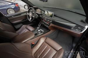 Brown BMW X5 2015 in Riga, with an engine capacity of 3.00 L and mileage of 237 thousand km for 21990 €, photo 30 on AUTOMOTO.COM.LV