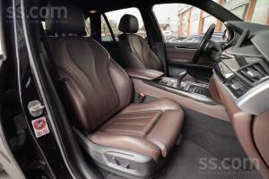 Brown BMW X5 2015 in Riga, with an engine capacity of 3.00 L and mileage of 237 thousand km for 21990 €, photo 31 on AUTOMOTO.COM.LV