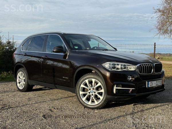 Brown BMW X5 2015 in Tukums, with an engine capacity of 3.00 L and mileage of 216 thousand km for 20990 €, photo 2 on AUTOMOTO.COM.LV