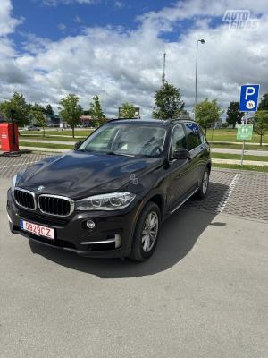 Brown BMW X5 2015 in Mazeikiai, with an engine capacity of 3.00 L and mileage of 300 thousand km for 12500 €, photo  on AUTOMOTO.COM.LV