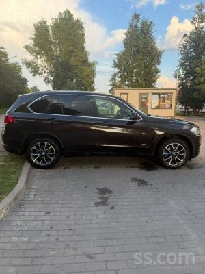 Brown BMW X5 2015 in Rezekne, with an engine capacity of 2.00 L and mileage of 247 thousand km for 15600 €, photo 5 on AUTOMOTO.COM.LV