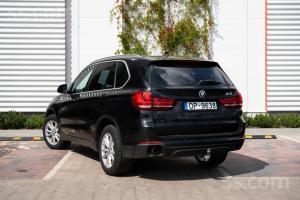 Brown BMW X5 2015 in Riga, with an engine capacity of 3.00 L and mileage of 327 thousand km for 15500 €, photo 4 on AUTOMOTO.COM.LV