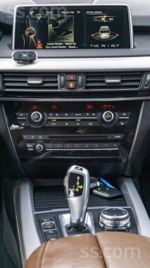 Brown BMW X5 2015 in Riga, with an engine capacity of 3.00 L and mileage of 259 thousand km for 15490 €, photo 13 on AUTOMOTO.COM.LV