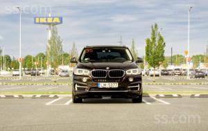 Brown BMW X5 2015 in Riga, with an engine capacity of 3.00 L and mileage of 259 thousand km for 15490 €, photo 4 on AUTOMOTO.COM.LV