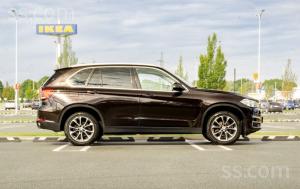 Brown BMW X5 2015 in Riga, with an engine capacity of 3.00 L and mileage of 259 thousand km for 15490 €, photo 10 on AUTOMOTO.COM.LV