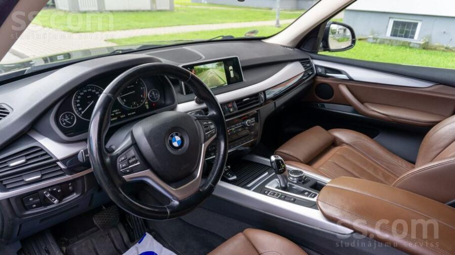 Brown BMW X5 2015 in Riga, with an engine capacity of 3.00 L and mileage of 259 thousand km for 15490 €, photo 11 on AUTOMOTO.COM.LV