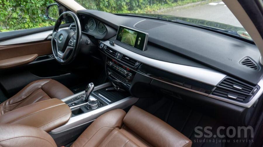 Brown BMW X5 2015 in Riga, with an engine capacity of 3.00 L and mileage of 259 thousand km for 15490 €, photo 12 on AUTOMOTO.COM.LV