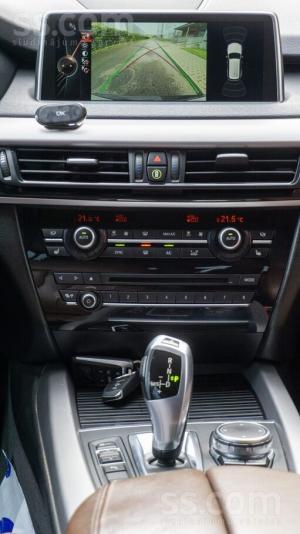 Brown BMW X5 2015 in Riga, with an engine capacity of 3.00 L and mileage of 259 thousand km for 15490 €, photo 14 on AUTOMOTO.COM.LV