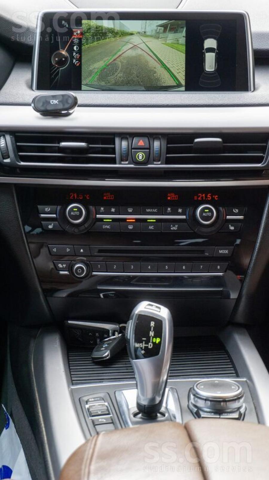 Brown BMW X5 2015 in Riga, with an engine capacity of 3.00 L and mileage of 259 thousand km for 15490 €, photo 14 on AUTOMOTO.COM.LV