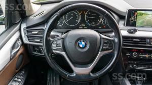 Brown BMW X5 2015 in Riga, with an engine capacity of 3.00 L and mileage of 259 thousand km for 15490 €, photo 15 on AUTOMOTO.COM.LV