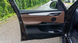 Brown BMW X5 2015 in Riga, with an engine capacity of 3.00 L and mileage of 259 thousand km for 15490 €, photo 26 on AUTOMOTO.COM.LV