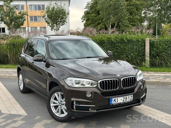Brown BMW X5 2015 in Jelgava, with an engine capacity of 3.00 L and mileage of 297 thousand km for 13990 €, photo 4 on AUTOMOTO.COM.LV