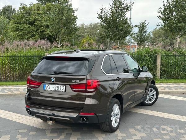 Brown BMW X5 2015 in Jelgava, with an engine capacity of 3.00 L and mileage of 297 thousand km for 13990 €, photo 6 on AUTOMOTO.COM.LV