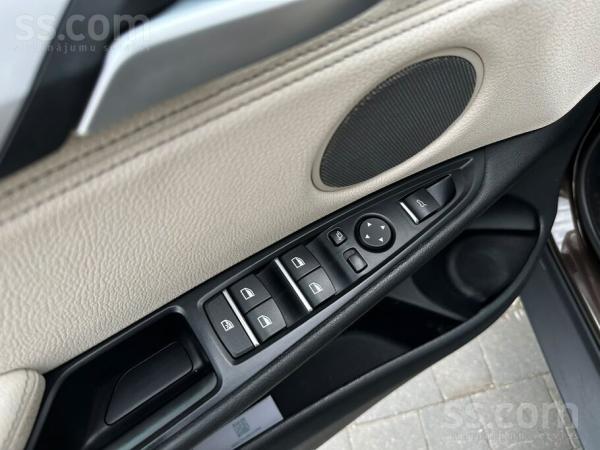 Brown BMW X5 2015 in Jelgava, with an engine capacity of 3.00 L and mileage of 297 thousand km for 13990 €, photo 11 on AUTOMOTO.COM.LV