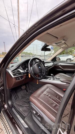 Brown BMW X5 2015 in Liepaja, with an engine capacity of 3.00 L and mileage of 254 thousand km for 15000 €, photo 7 on AUTOMOTO.COM.LV