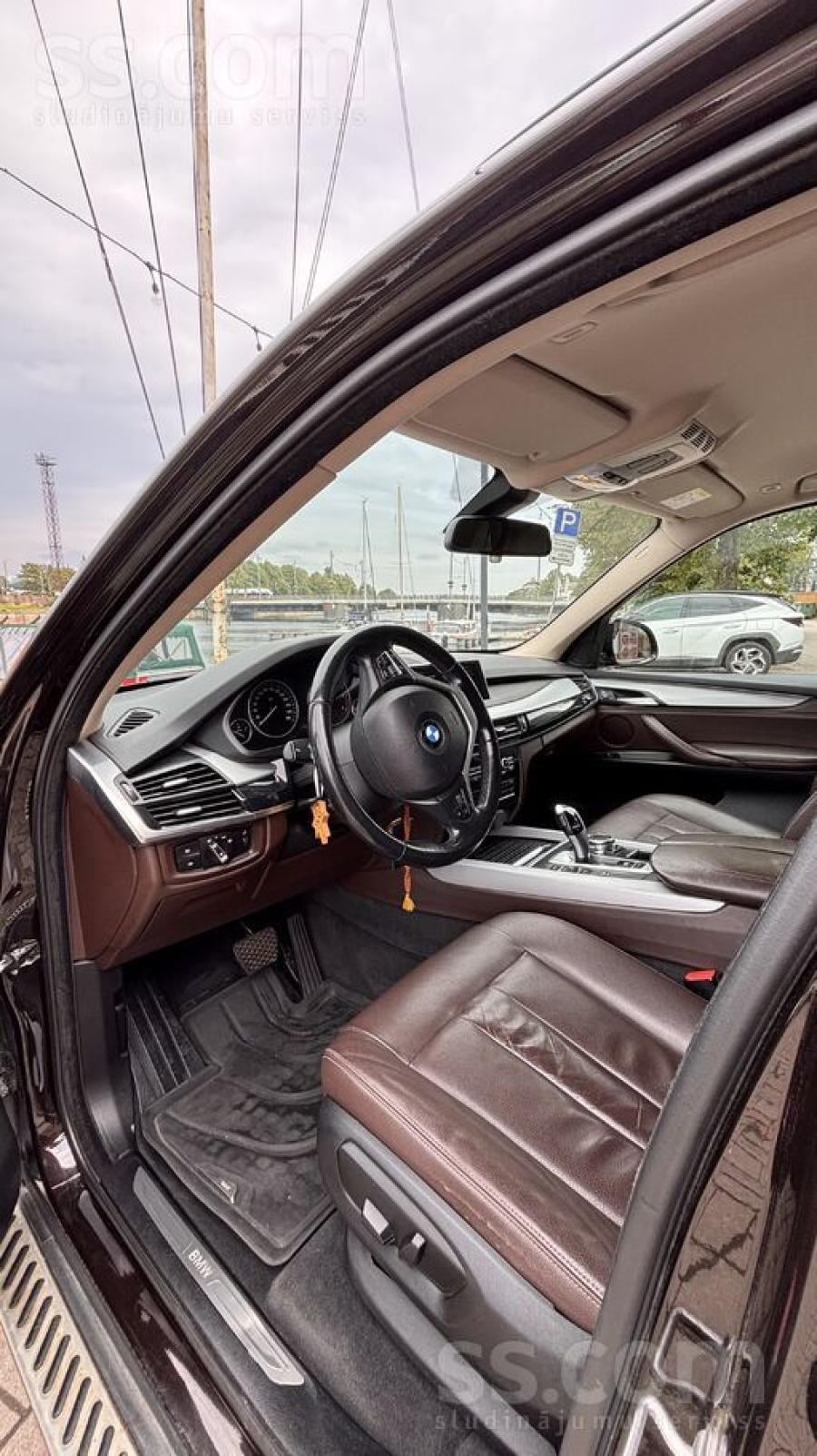 Brown BMW X5 2015 in Liepaja, with an engine capacity of 3.00 L and mileage of 254 thousand km for 15000 €, photo 7 on AUTOMOTO.COM.LV