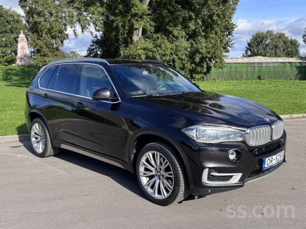 Brown BMW X5 2015 in Riga, with an engine capacity of 3.00 L and mileage of 0 thousand km for 16950 €, photo 4 on AUTOMOTO.COM.LV