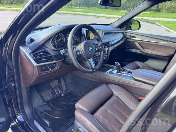 Brown BMW X5 2015 in Riga, with an engine capacity of 3.00 L and mileage of 0 thousand km for 16950 €, photo 9 on AUTOMOTO.COM.LV