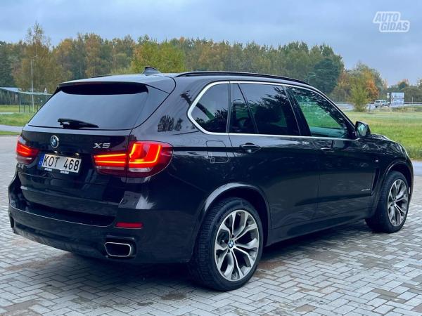 Brown BMW X5 2015 in Panevezys, with an engine capacity of 3.00 L and mileage of 349 thousand km for 14800 €, photo 5 on AUTOMOTO.COM.LV