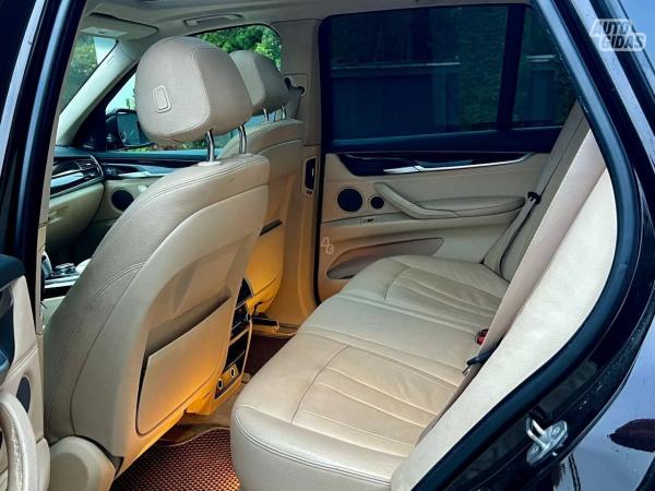 Brown BMW X5 2015 in Panevezys, with an engine capacity of 3.00 L and mileage of 349 thousand km for 14800 €, photo 7 on AUTOMOTO.COM.LV