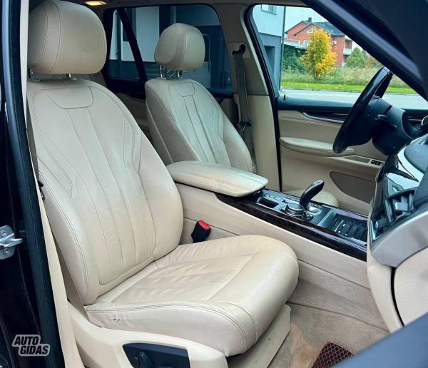 Brown BMW X5 2015 in Panevezys, with an engine capacity of 3.00 L and mileage of 349 thousand km for 14800 €, photo 9 on AUTOMOTO.COM.LV
