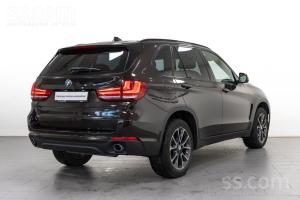 Brown BMW X5 2016 in Riga, with an engine capacity of 3.00 L and mileage of 251 thousand km for 18900 €, photo 2 on AUTOMOTO.COM.LV